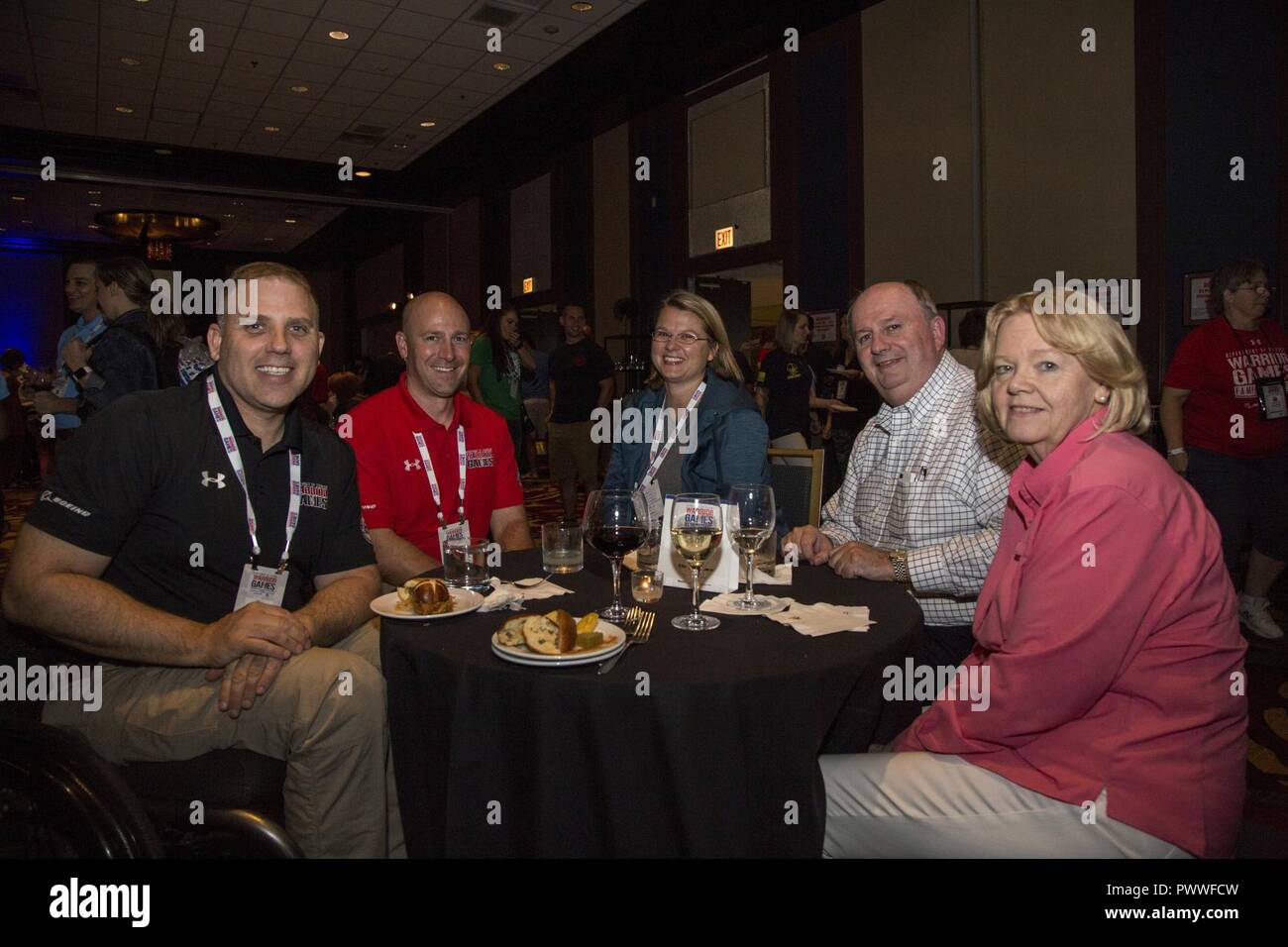 U.S. Marine Corps Gunnery Sgt. Douglas Godfrey Jr. and his family pose ...