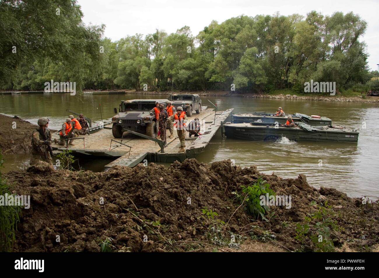 Soldiers assigned to 2d Cavalry Regiment, U.S. Army have their humvees ...