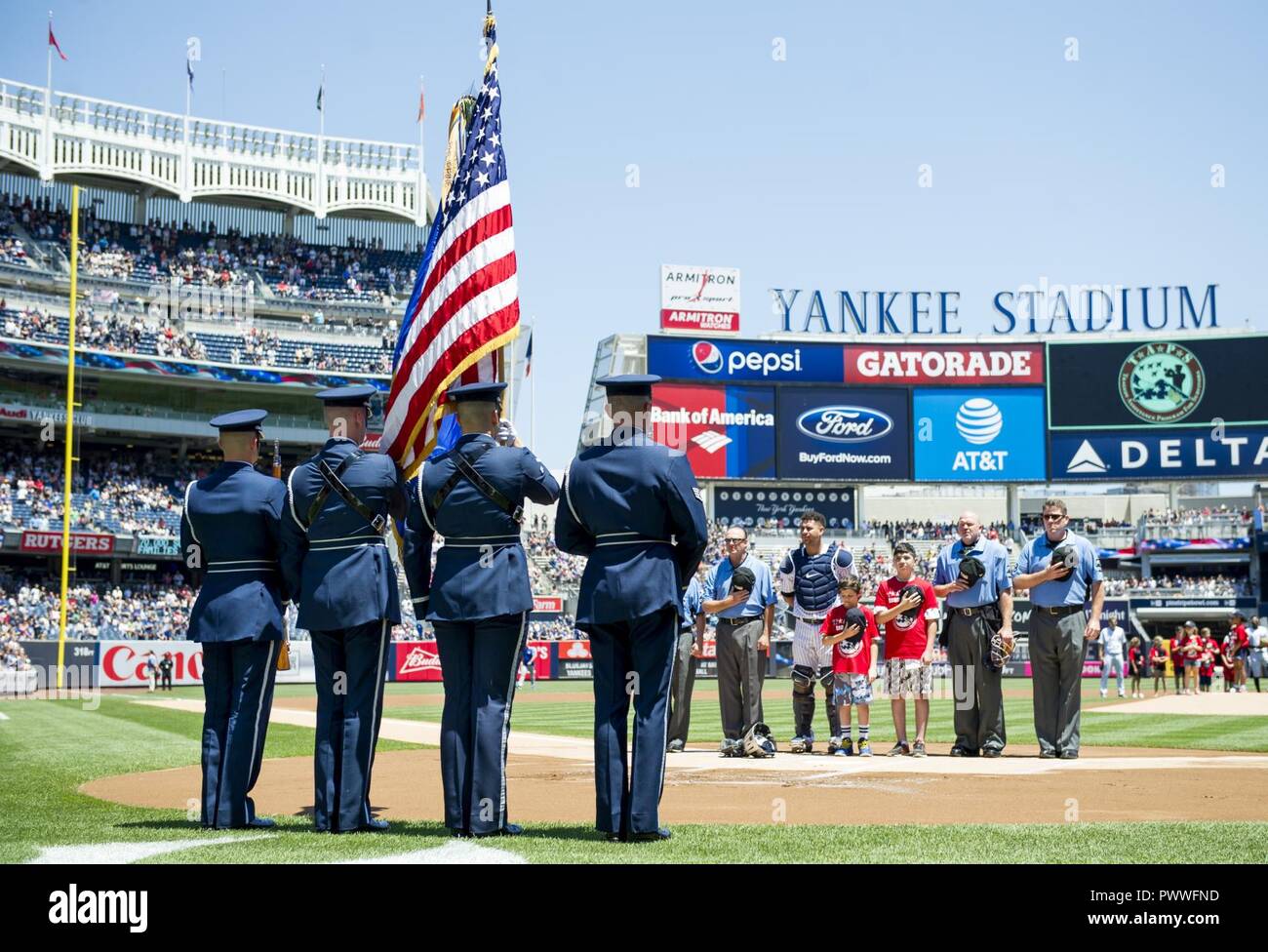 A color guard from the U.S. Air Force Honor Guard presents the colors ...