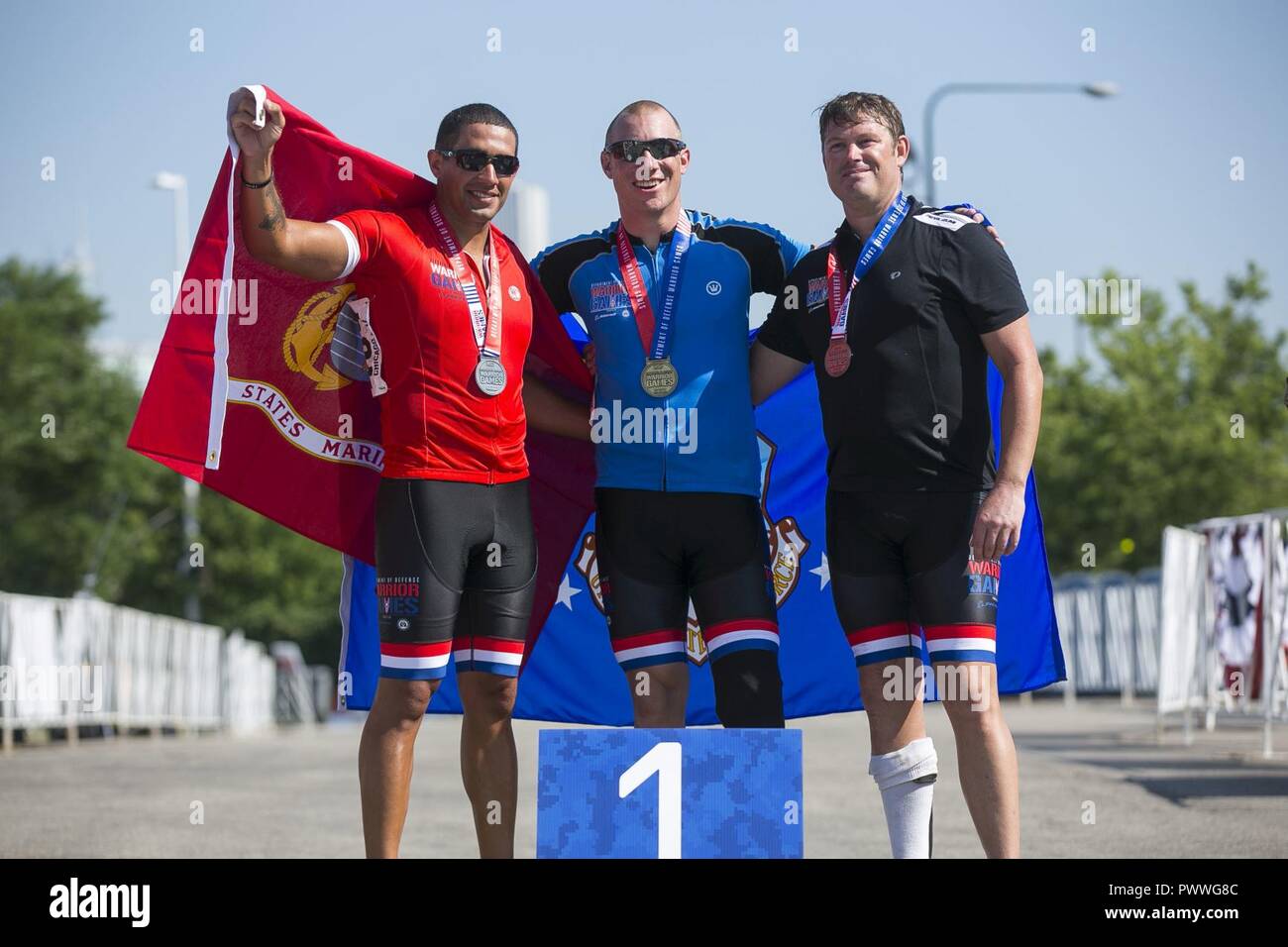 U.S. Marine Corps Gunnery Sgt. Alexis Padilla, left, poses with the ...