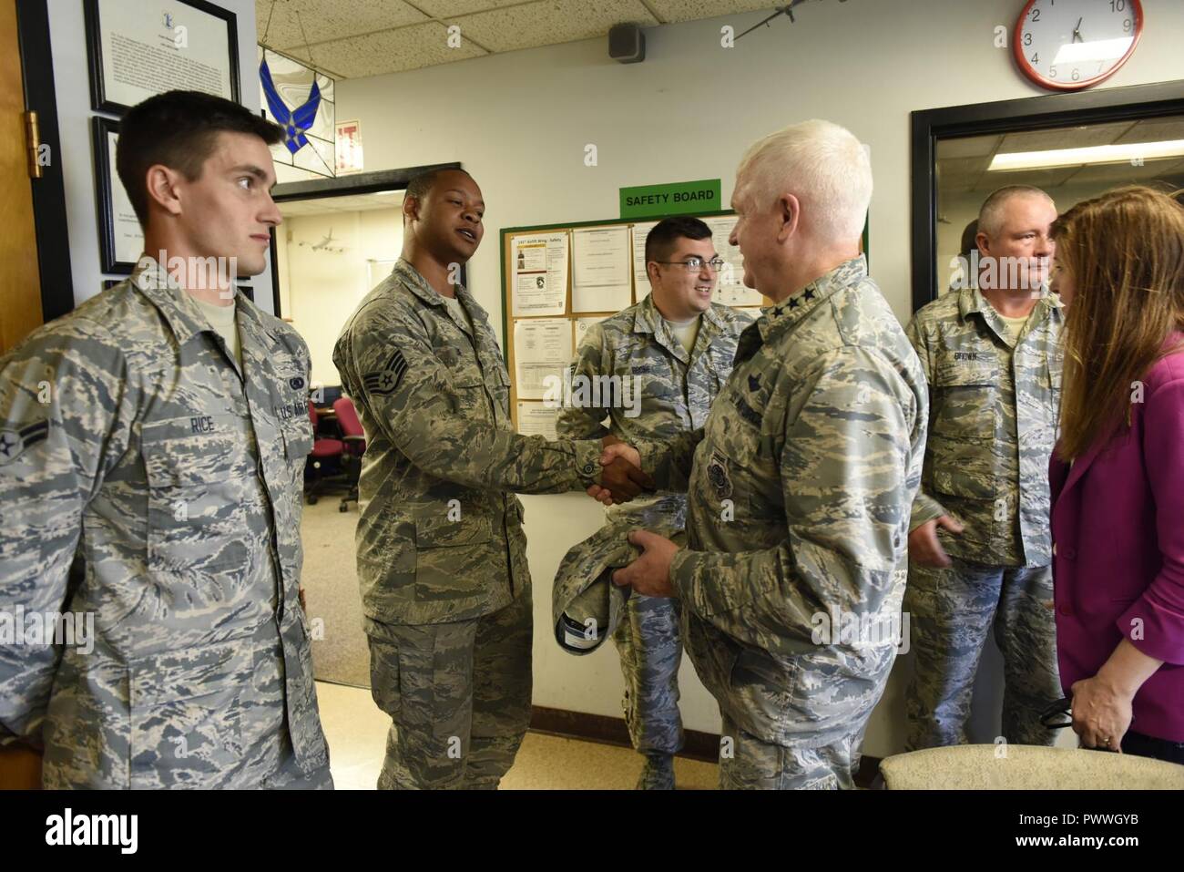 Airmen of the 145th Logistics Readiness Squadron shake hands with U.S ...