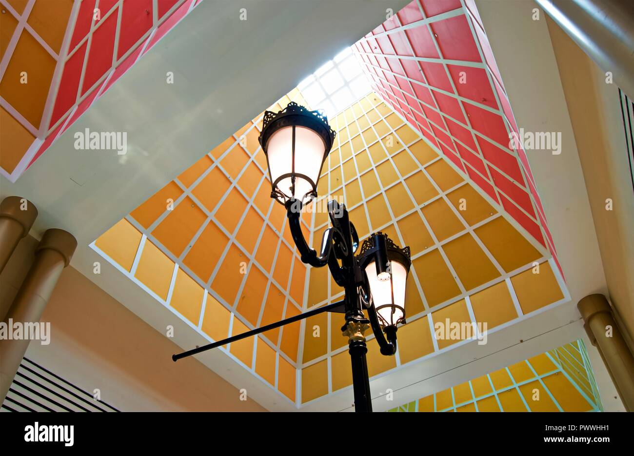 Abstract perspective of vertical lobby ceiling with skylight, vintage ...