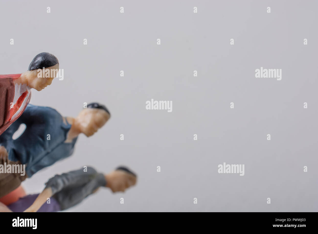 Tiny figurine of men miniature model in view Stock Photo - Alamy