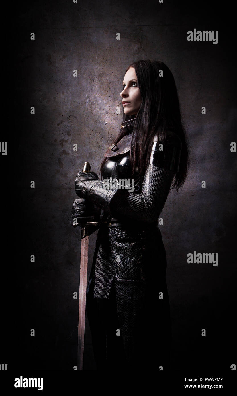 Portrait of a woman in medieval armor Stock Photo - Alamy