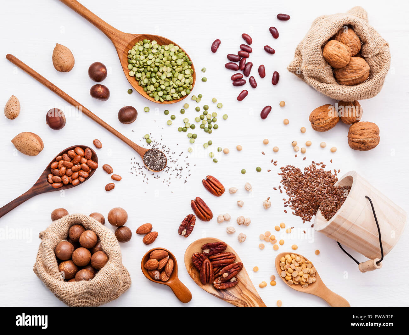 Various legumes and different kinds of nuts walnuts kernels ,hazelnuts ...
