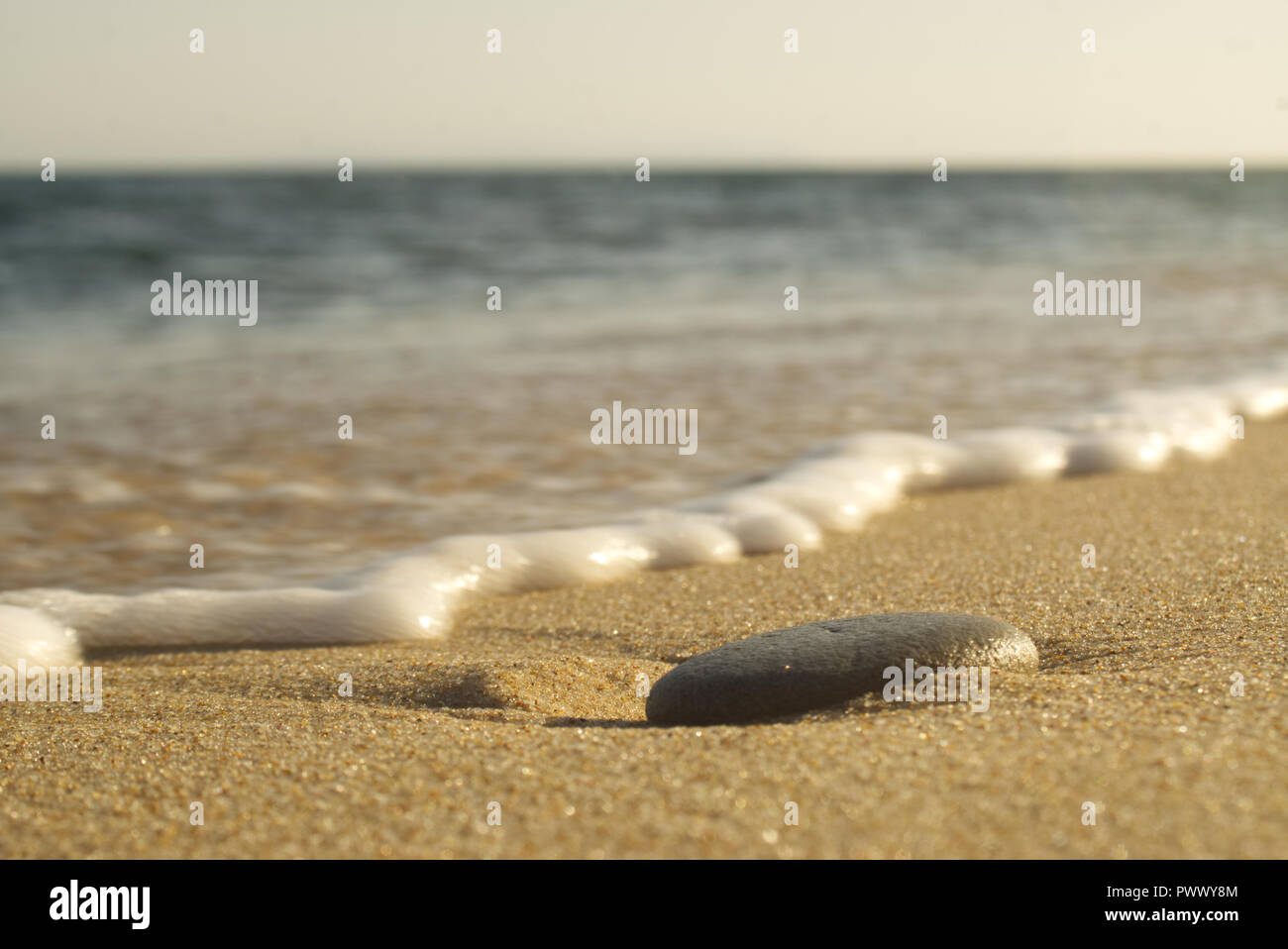 Stone on the Beach Stock Photo - Alamy