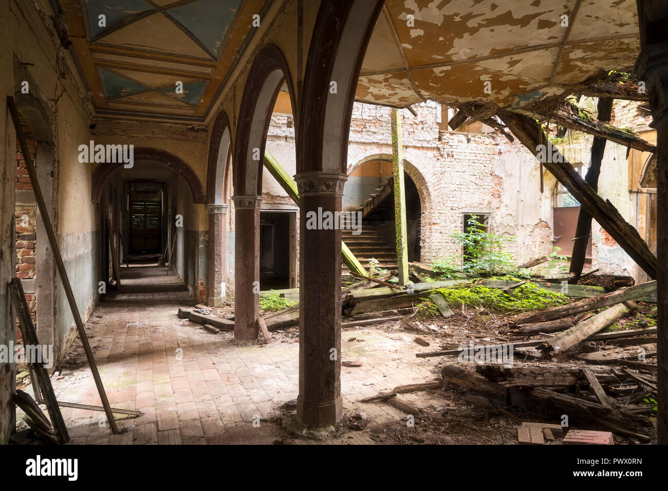 Rubble lying in a hallway of an abandoned castle in Germany Stock Photo ...