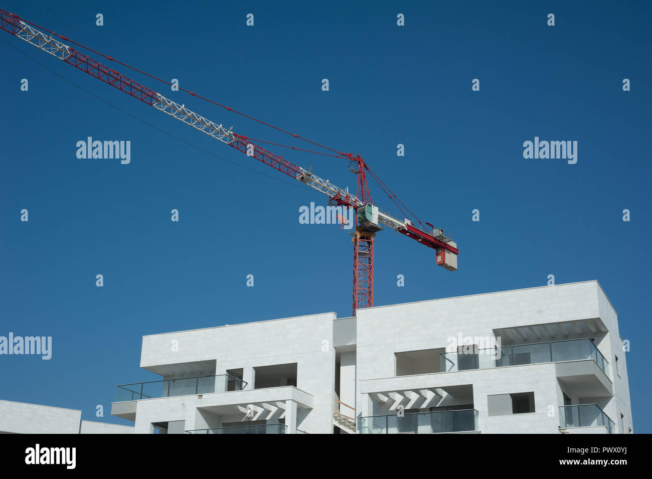 new building with crane Stock Photo - Alamy