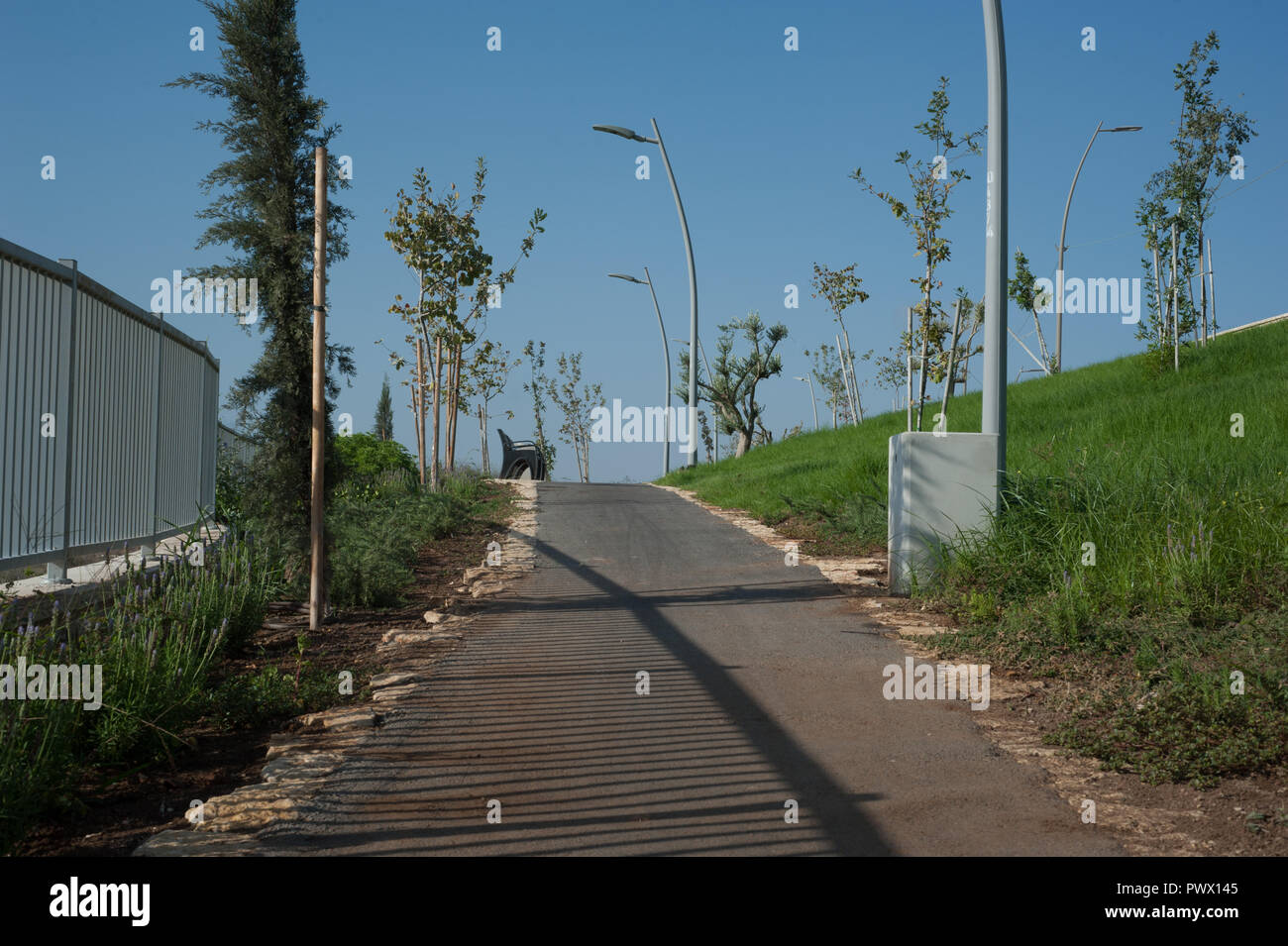 garden path, green area, Modiin City Stock Photo - Alamy