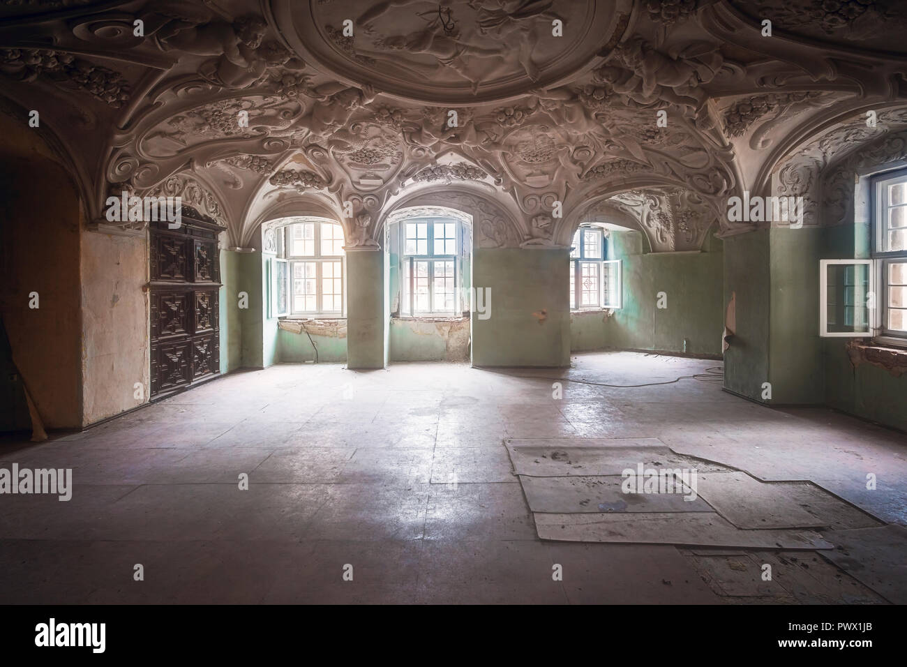 Interior view of a room with a beautiful ceiling in an abandoned castle ...