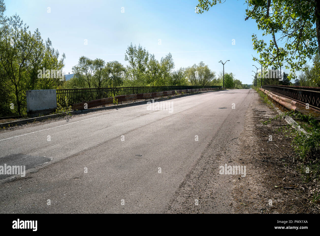 View along the road across the infamous Bridge of Death in Chernobyl ...