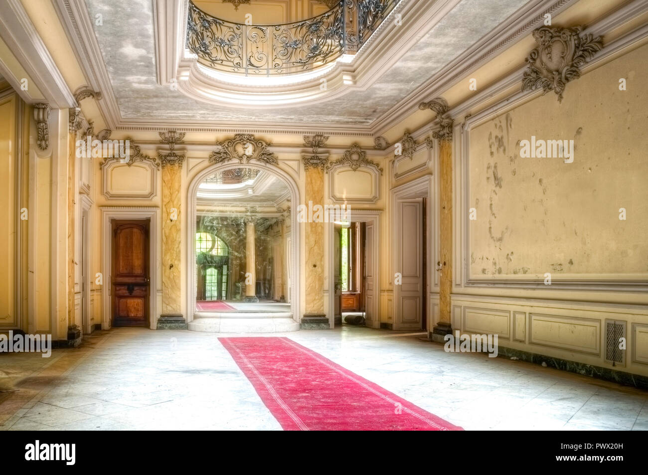 Interior view of the hall in an abandoned castle in France Stock Photo ...
