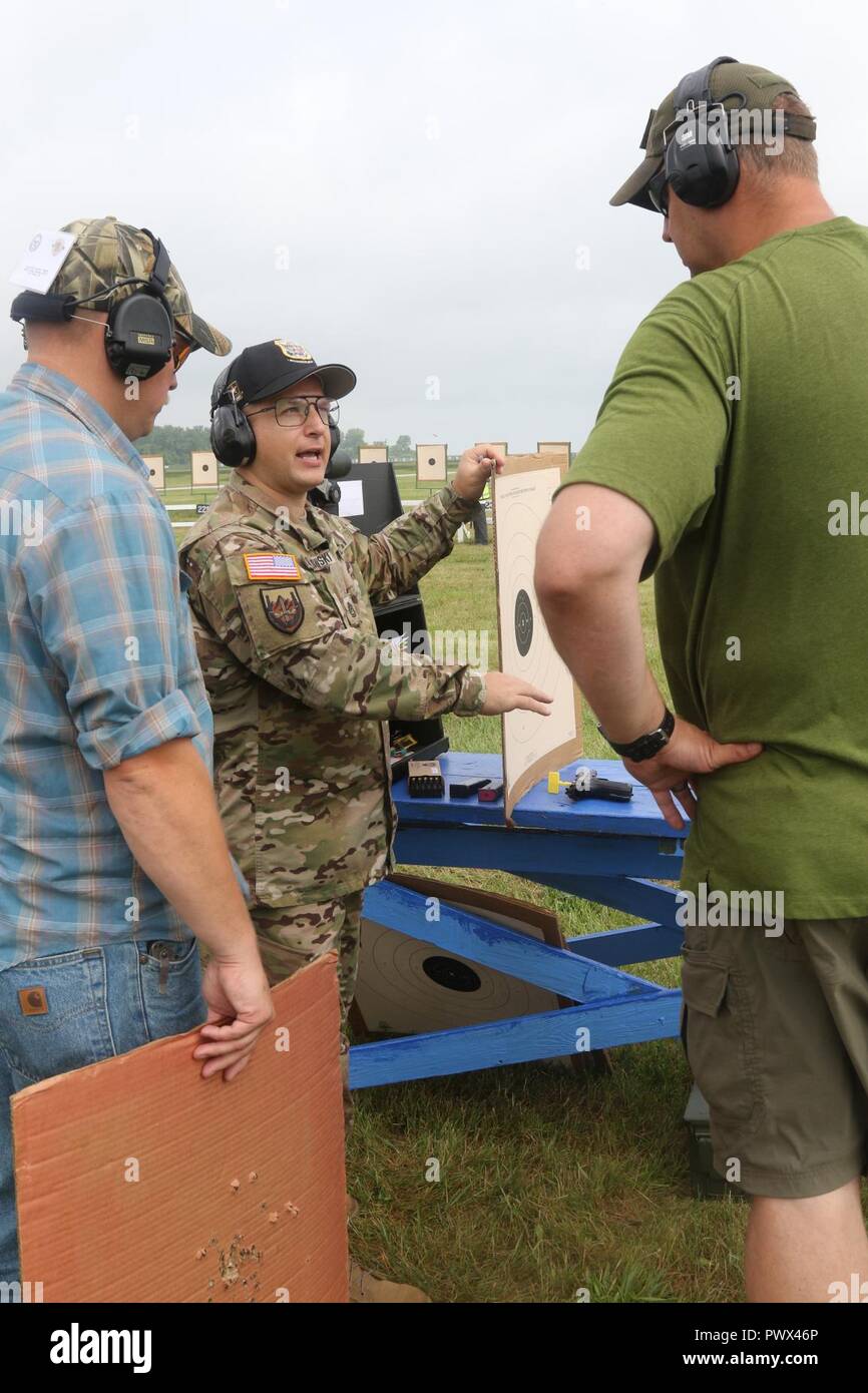 Sgt. 1st Class Adam Sokolowski, the Service Pistol Team chief and coach ...