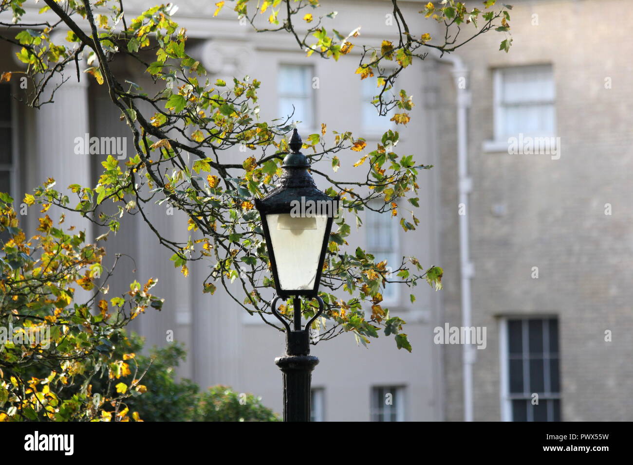 Old style gaslight lamppost in front of building, Kenwood, London Stock ...