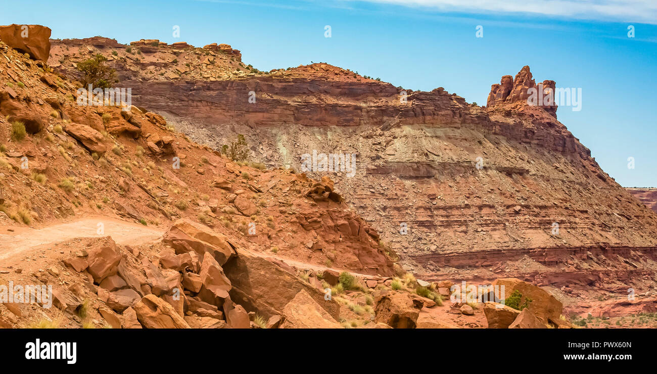 Sloping off road trail on an imposing mountain Stock Photo - Alamy