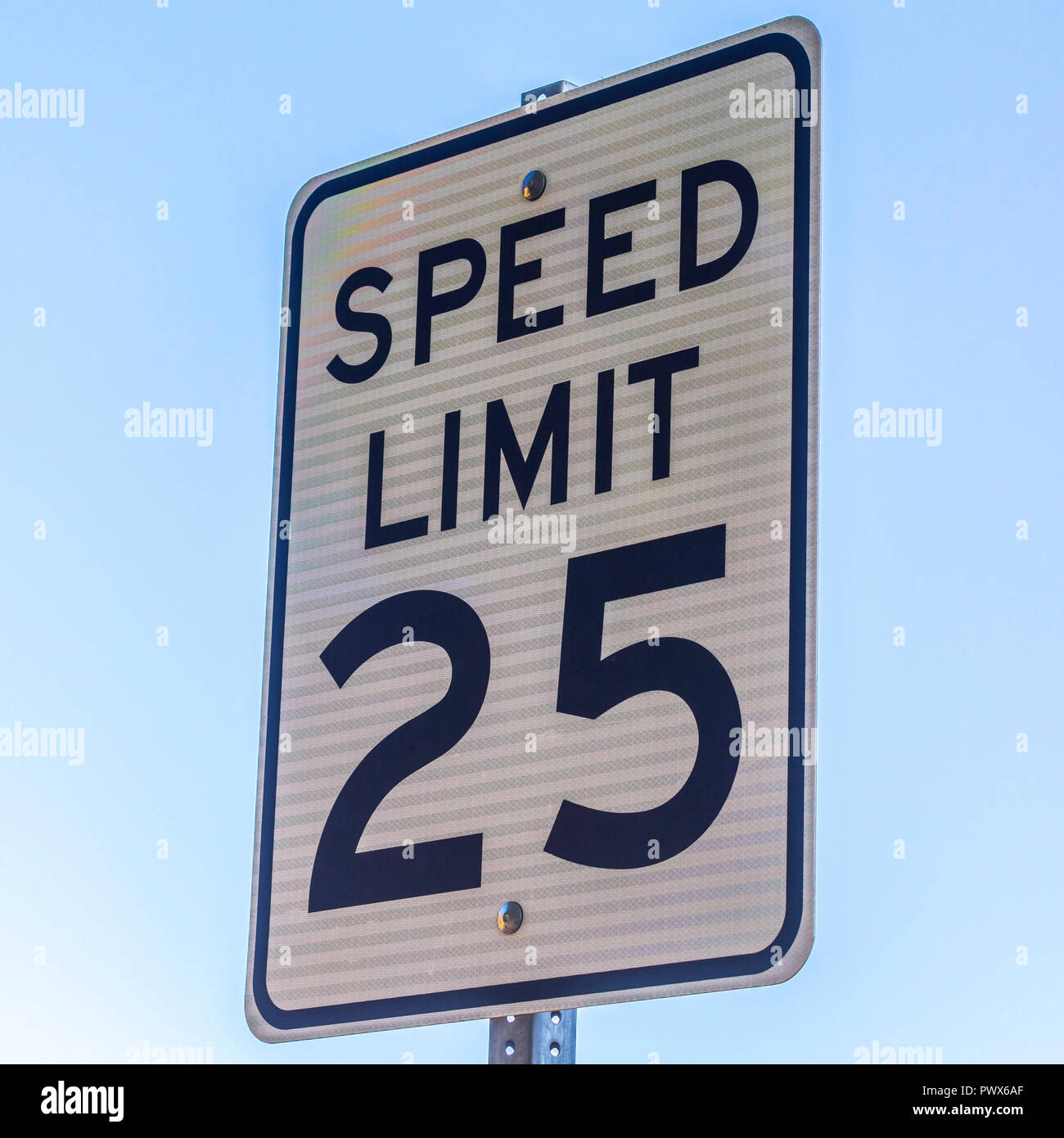 Speed limit road sign against a blue sky Stock Photo - Alamy