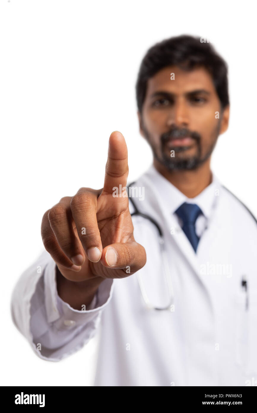 Male doctor using index finger to touch invisible screen with blank ... Male doctor using index finger to touch invisible screen with blank ...