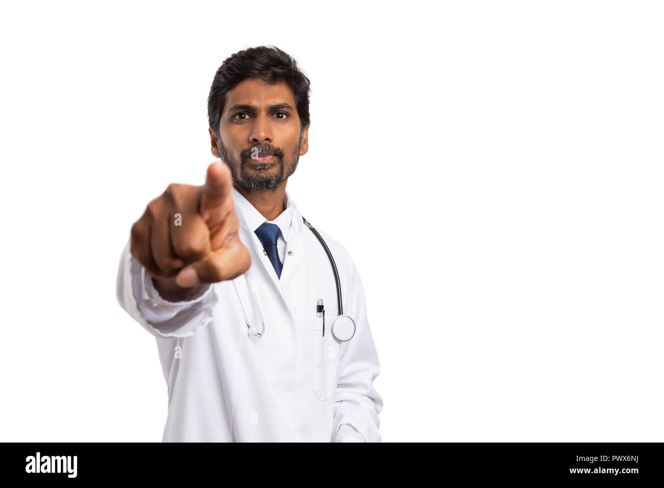 Serious indian man doctor or medic making choosing you gesture with ...