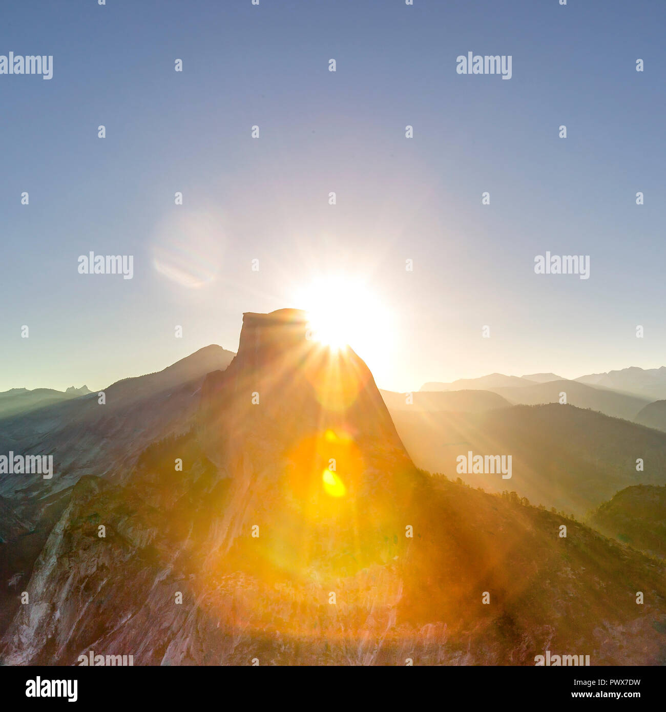 Sunrise view of Half Dome with lens flare Stock Photo - Alamy