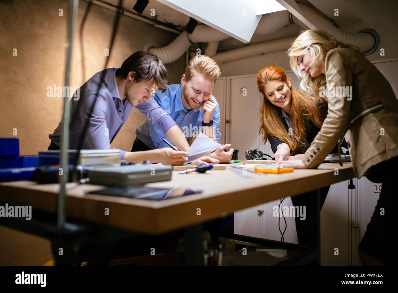 Team working on project together Stock Photo - Alamy