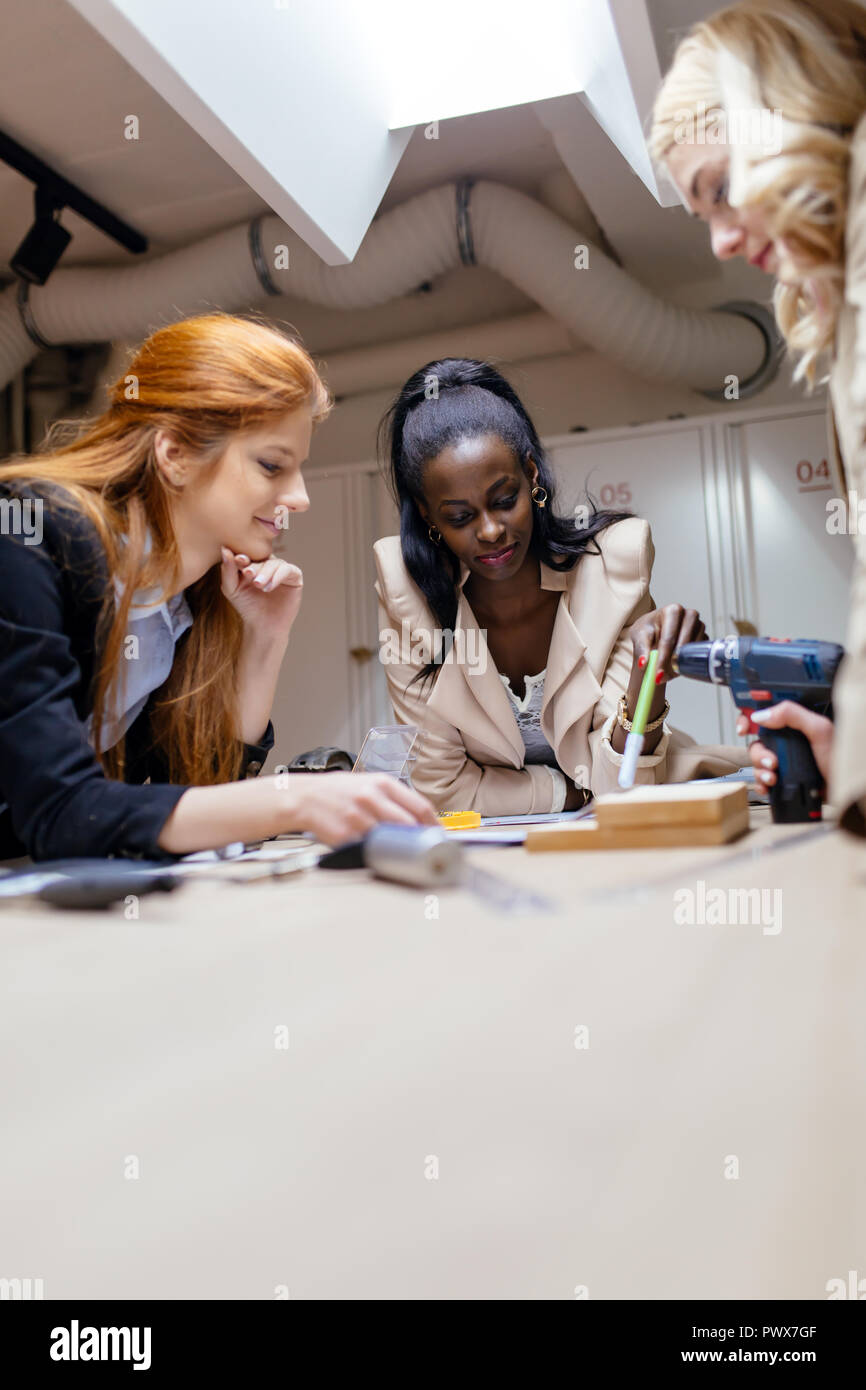 Creative group of people designing Stock Photo - Alamy