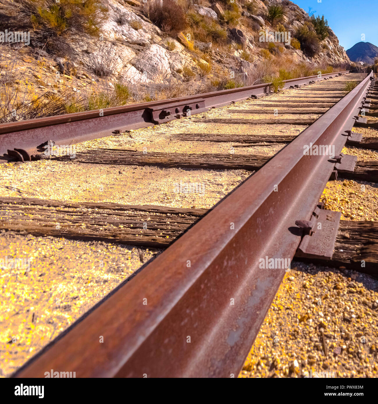 Train track beside road hi-res stock photography and images - Alamy
