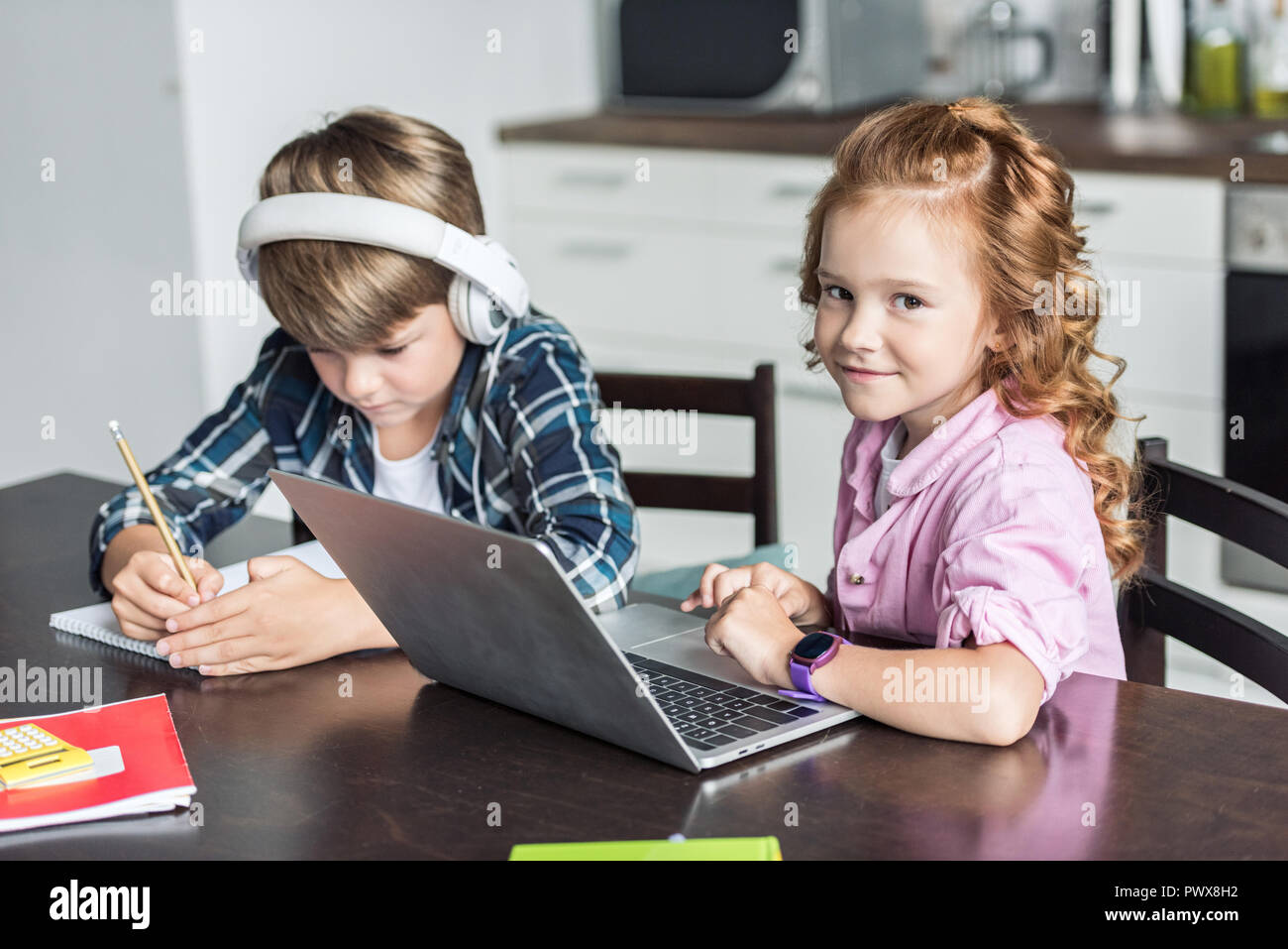 Brother and sister writing hi-res stock photography and images - Alamy