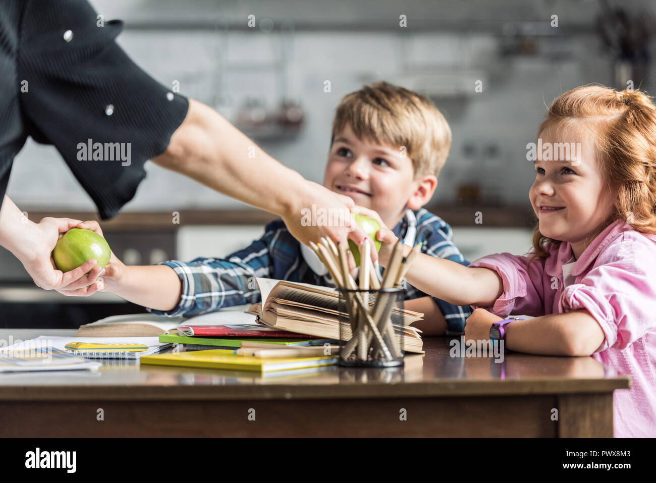 Giving food children hi-res stock photography and images - Alamy