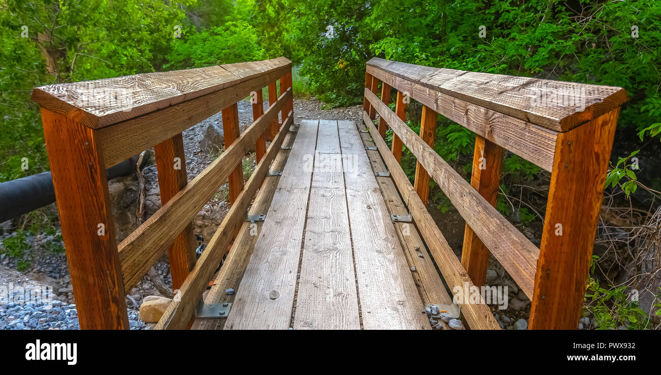 Wooden bridge over a rocky stream in Provo Canyon Stock Photo - Alamy