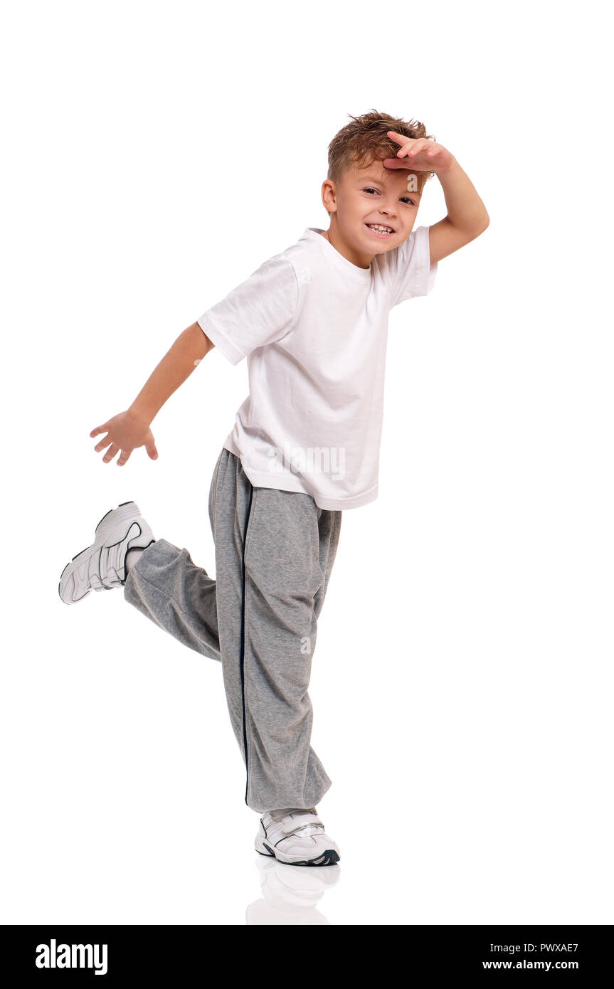 Happy little hip hop dancer - boy dancing isolated on white background ...