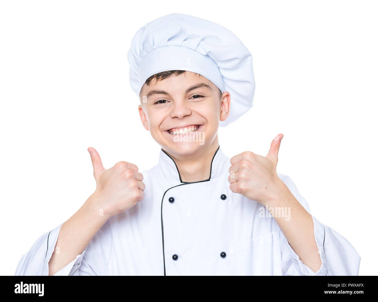 Handsome teen boy wearing chef uniform making thumbs up gesture ...