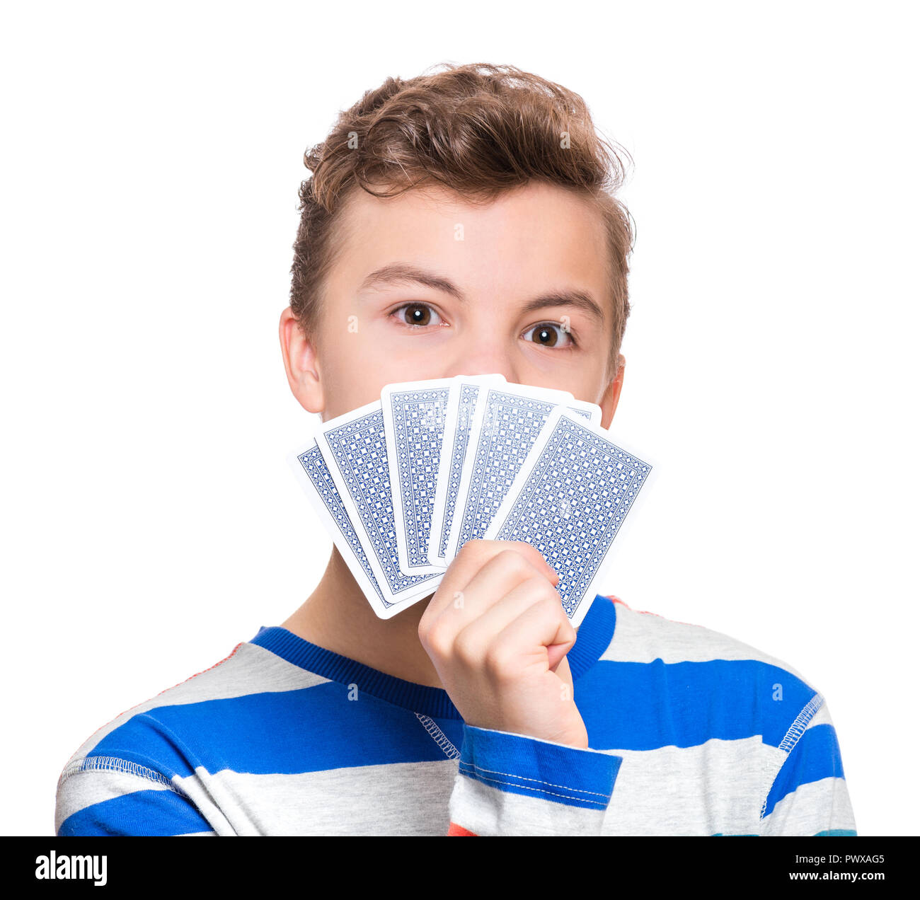 Close up portrait of caucasian teen boy with gamble cards. Handsome guy ...