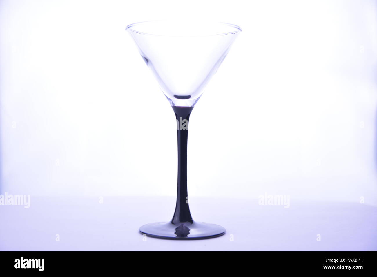 crystal transparent martini glass on a white background Stock Photo - Alamy