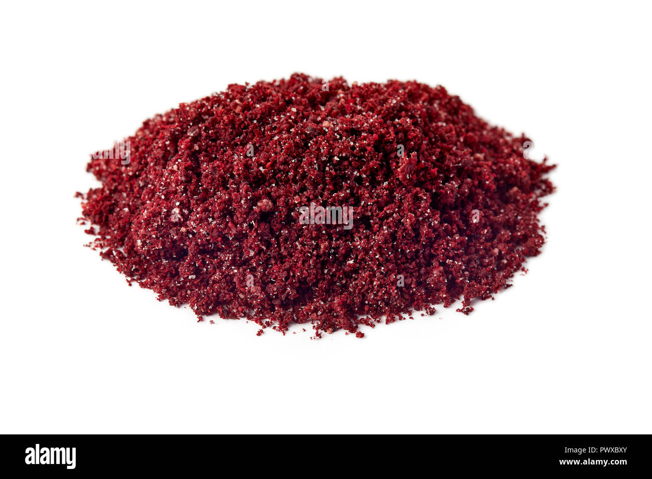Ground sumac spice powder isolated on white background Stock Photo - Alamy