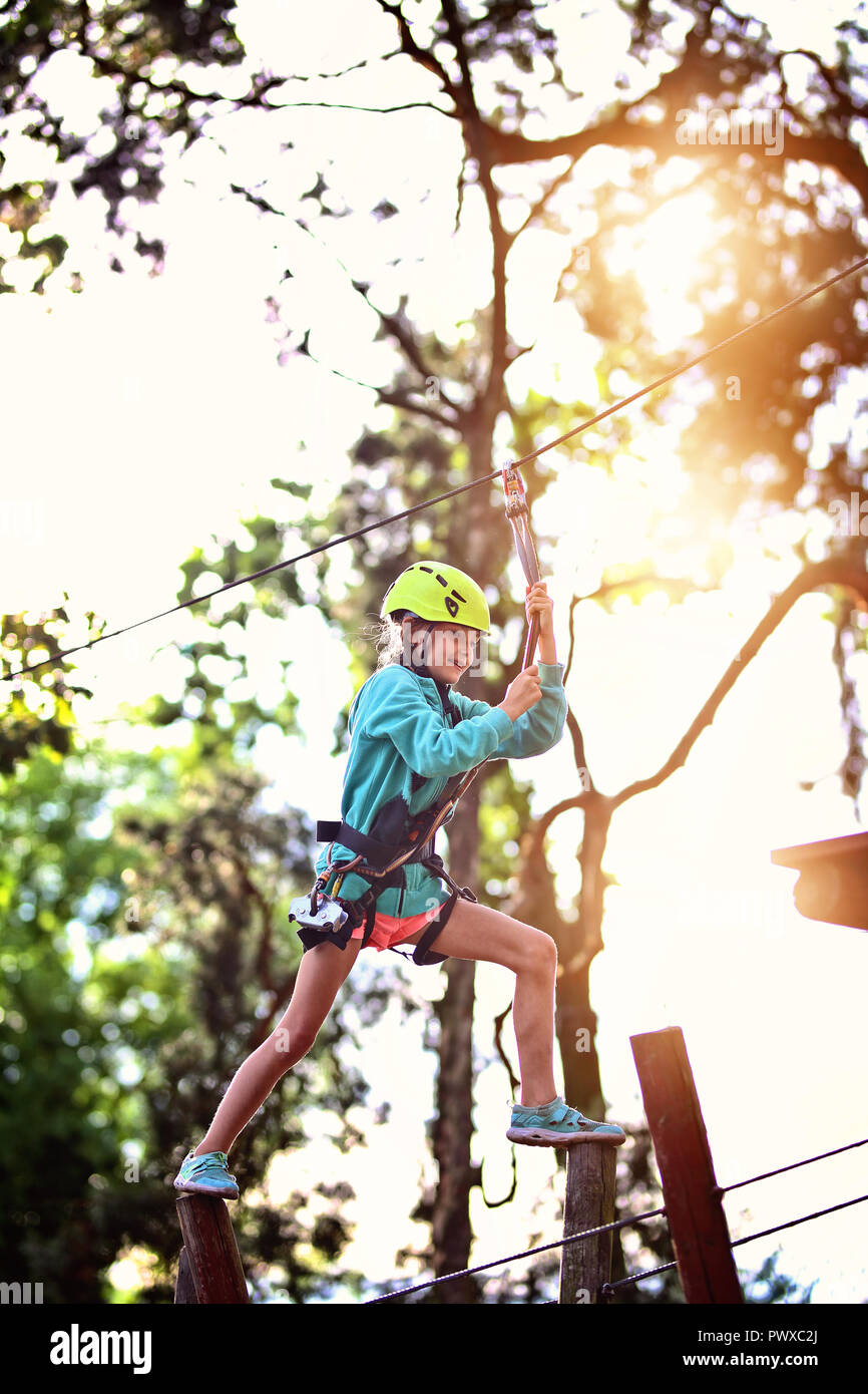 adventure in a rope park Stock Photo - Alamy
