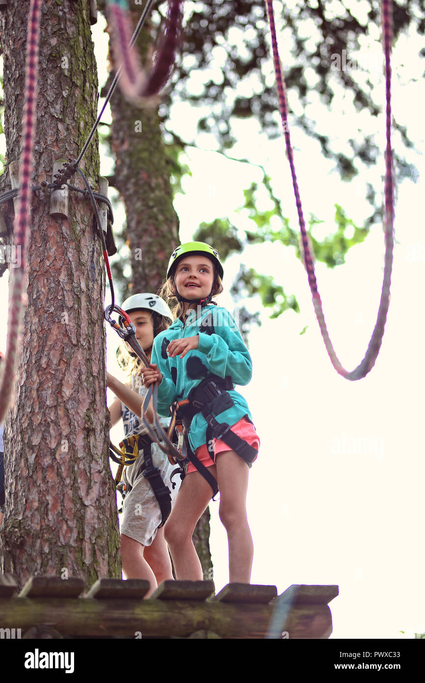 adventure in a rope park Stock Photo - Alamy