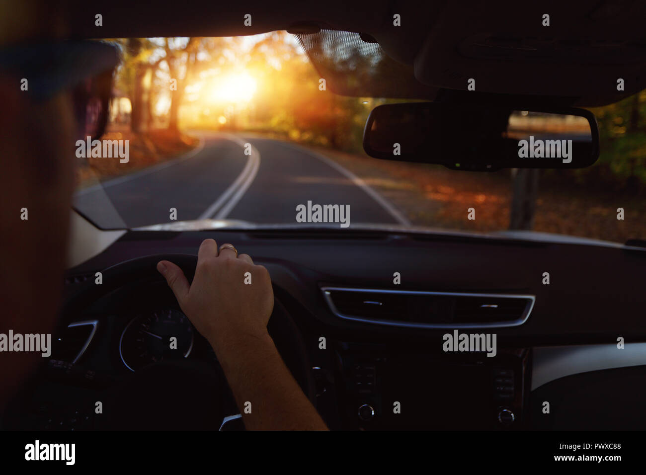 Car driving slowly street hi-res stock photography and images - Alamy