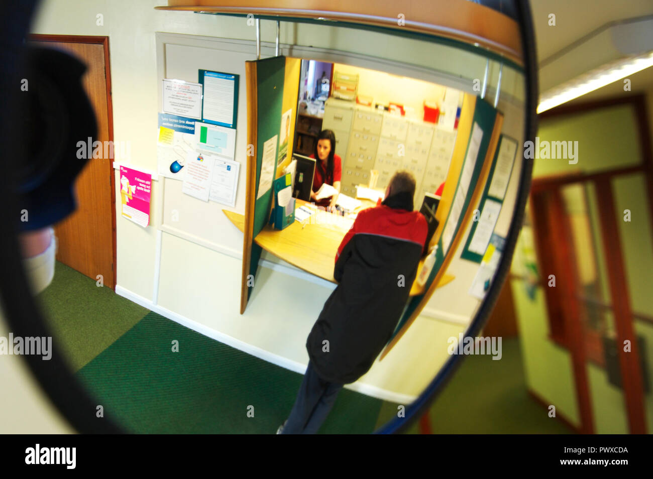 Gp surgery uk receptionist hi-res stock photography and images - Alamy