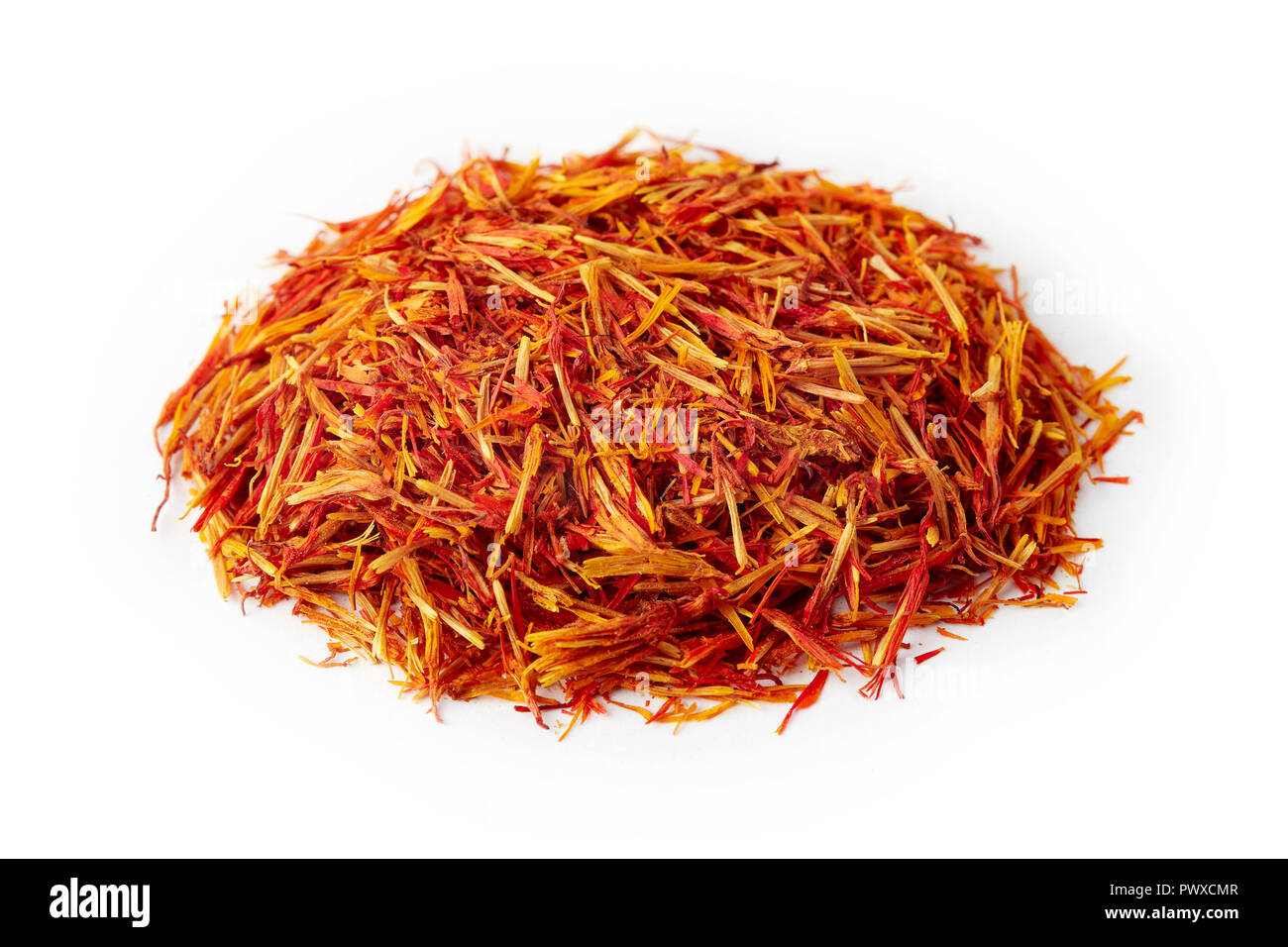 Safflower petals (Saffron substitute) isolated on white background ...