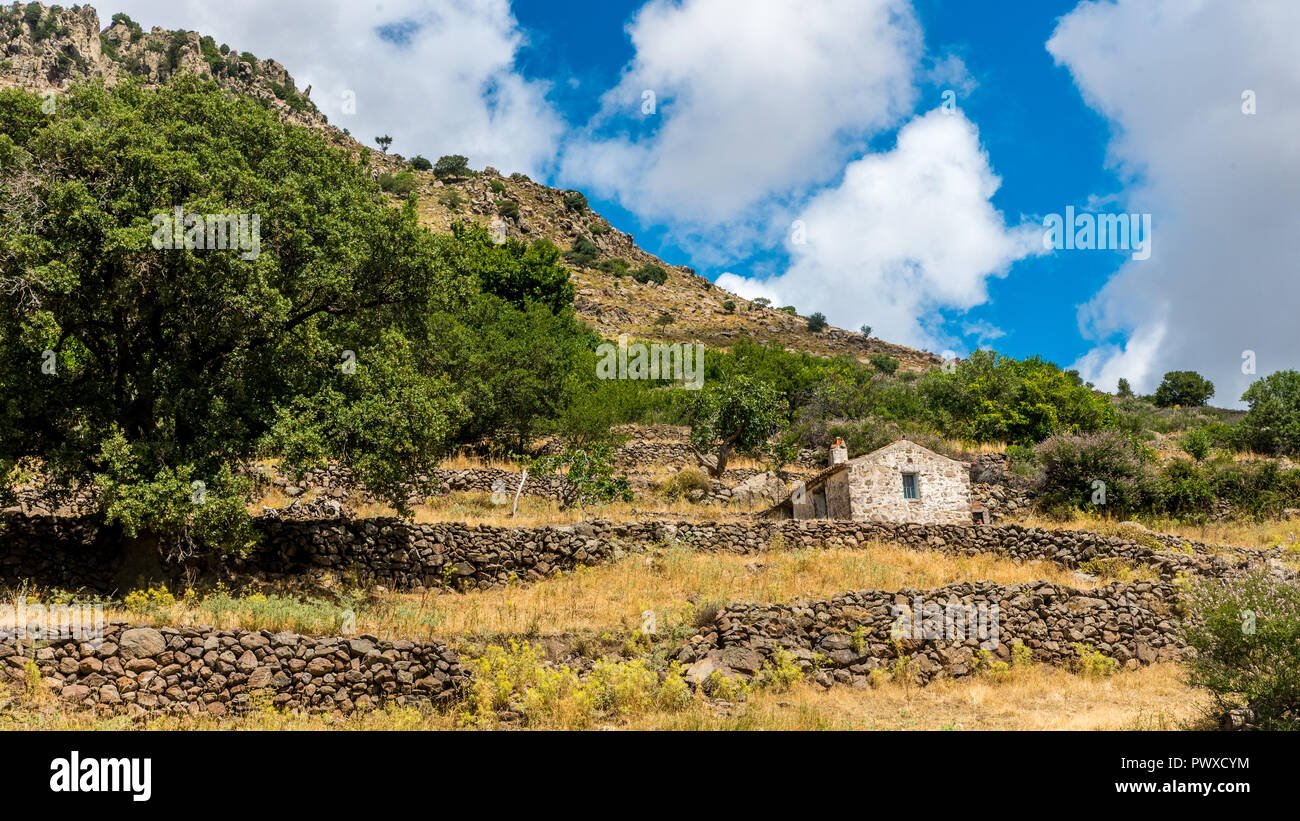 Old stone house and walls on mountain in Greece Stock Photo - Alamy