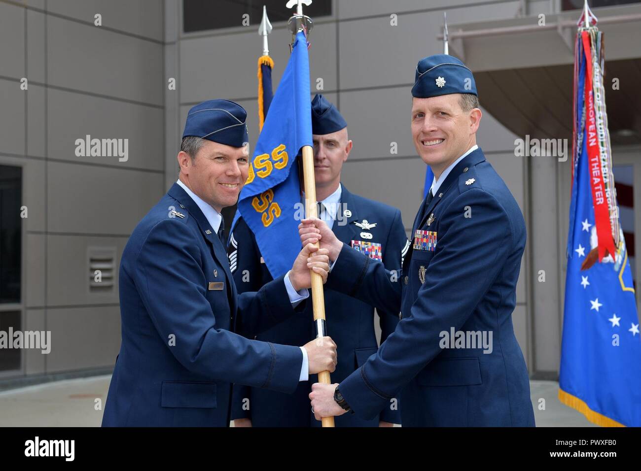 Col. Toby Doran, 50th Operations Group commander, hands the 50th ...