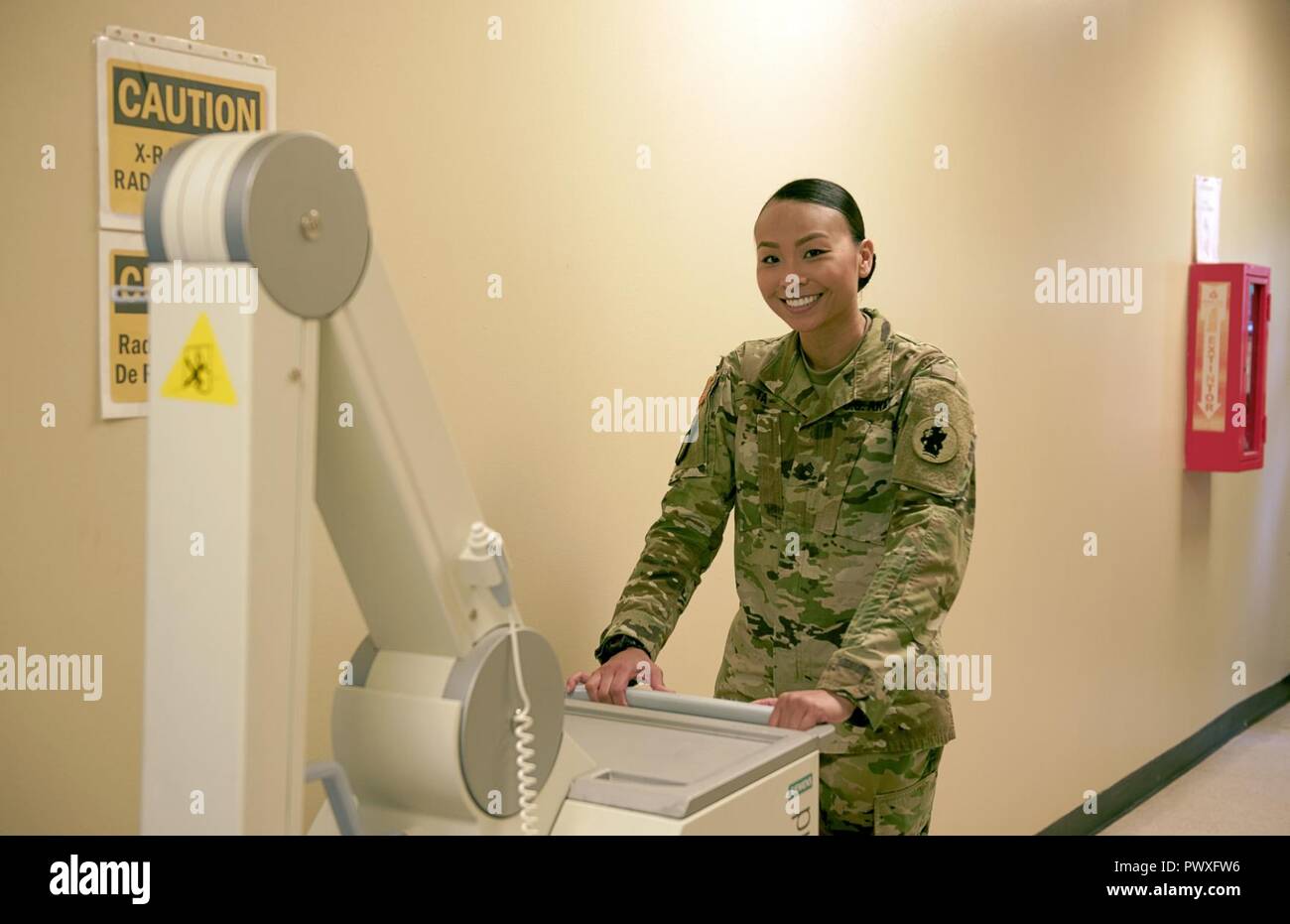 Sgt. 1st Class Trini Ta’s Call to Duty as a radiology technician at ...