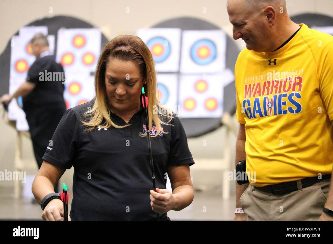 U.S. Army veteran Michelle Sanchez, San Antonio, Texas, places arrows ...