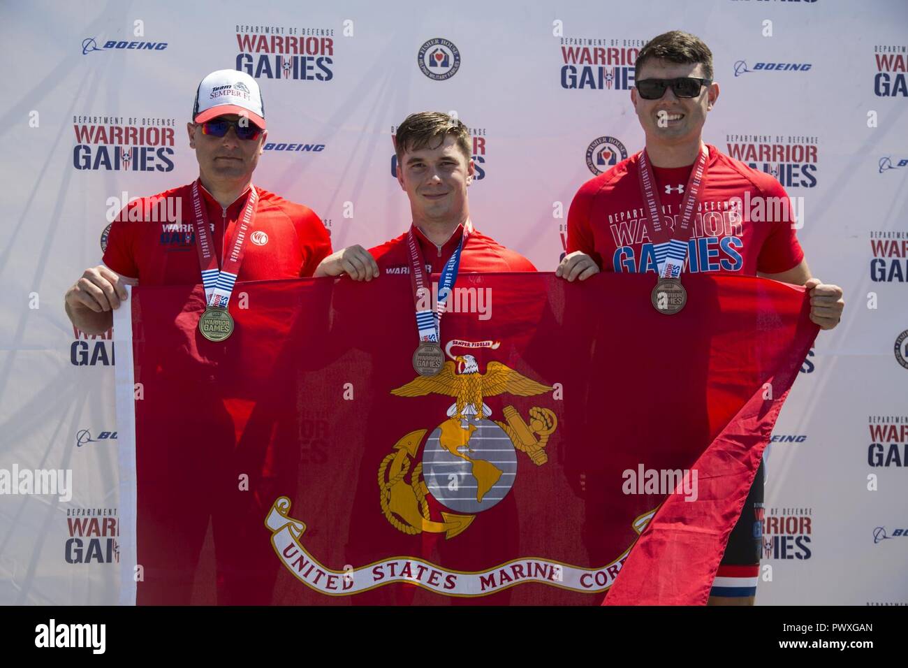 U.S. Marine Corps Gunnery Sgt. John Ayo, left, Cpl. Dakota Boyer ...