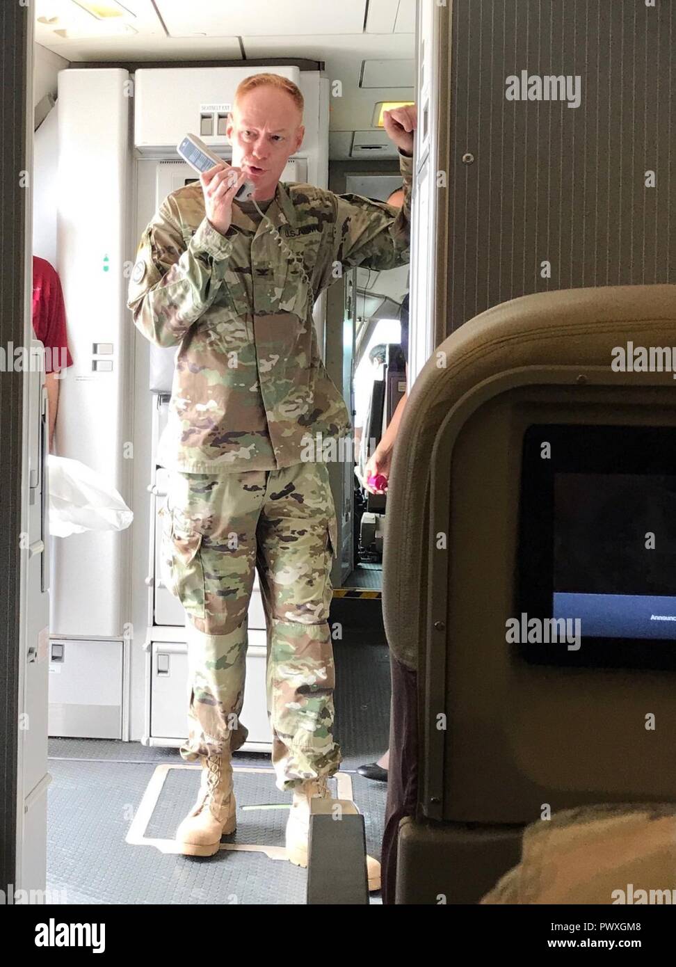 Col. Steven Barney, commander of the 230th Sustainment Brigade, speaks ...