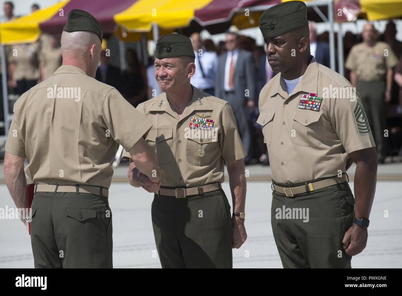 U.S. Marine Corps Col. Brian E. Bufton, left, outgoing commander for ...