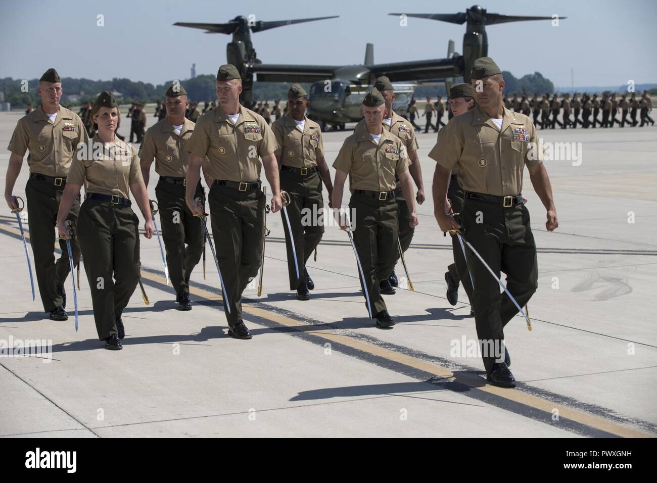 U.S. Marines march during a change of command ceremony for Helicopter ...