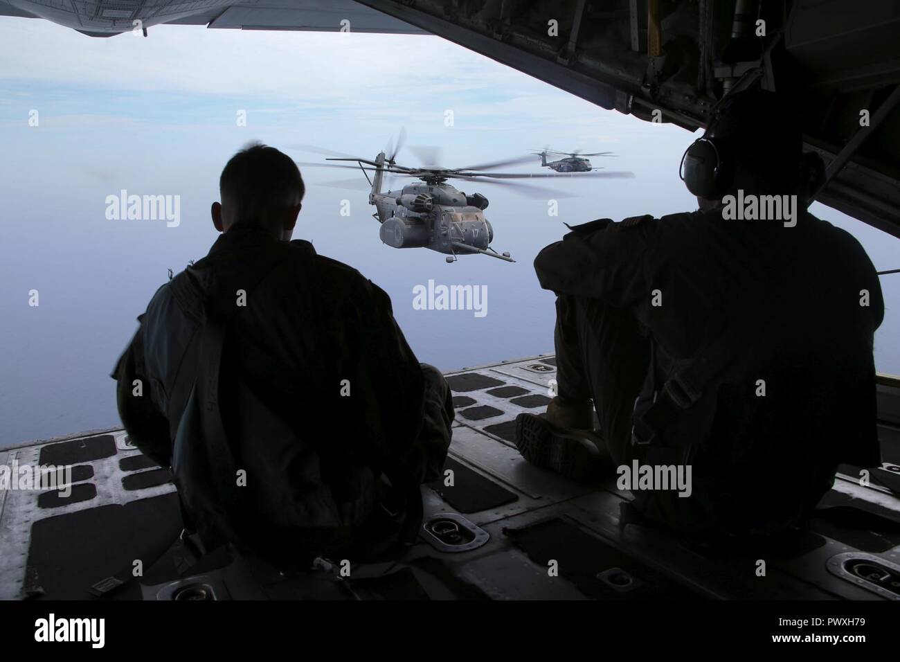 U.S Marine Corps Lance Cpl. Trystan Y. Jordan, left, with Combat Camera ...