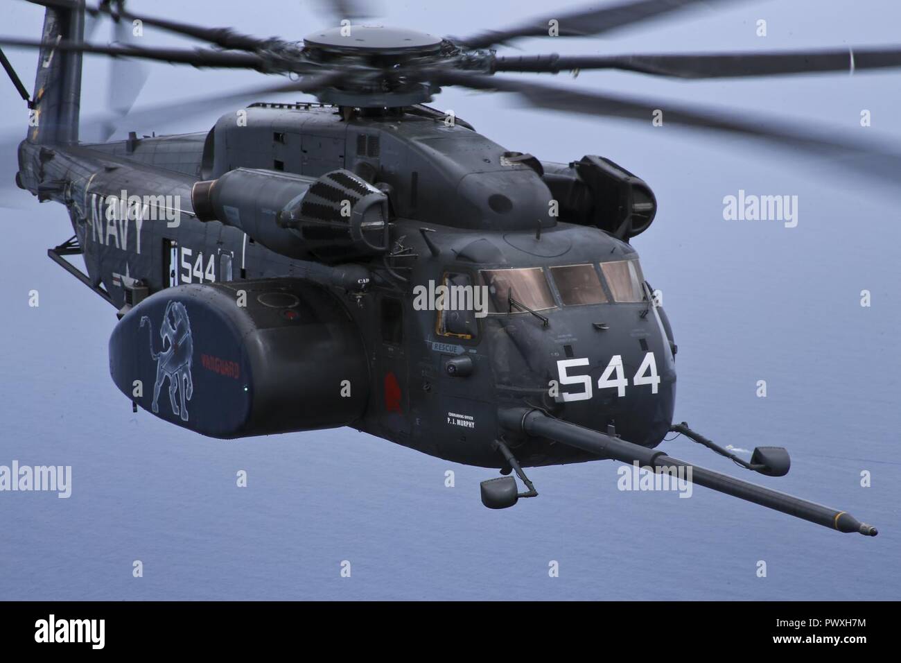 A U.S. Navy MH-53 Sea Dragon with Helicopter Mine Countermeasures Squadron 14, (HM-14) flies ...
