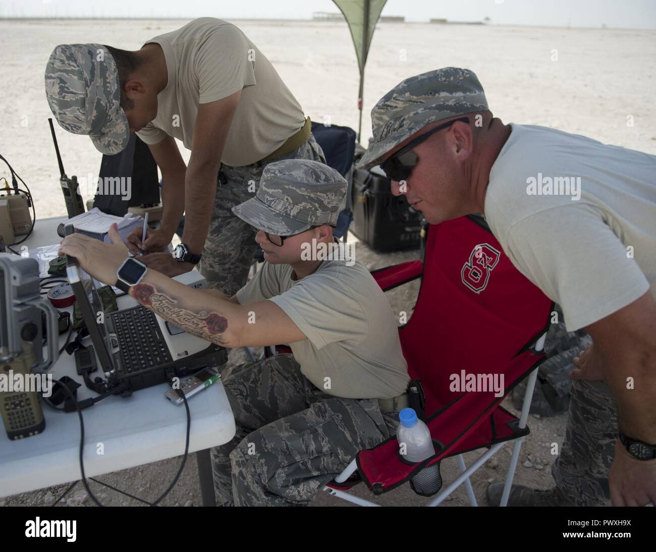 U.S. Air Force Senior Airman Luis Sandoval, left, Staff Sgt. Helen ...